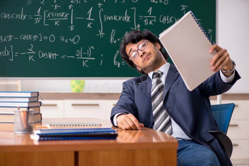 The Young Male Math Teacher in Classroom Stock Image - Image of ...