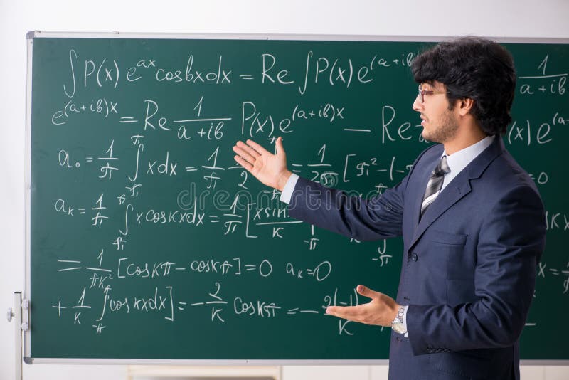 The Young Male Math Teacher in Classroom Stock Image - Image of ...