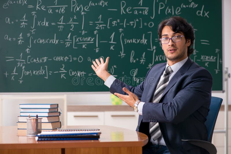 The Young Male Math Teacher in Classroom Stock Photo - Image of ...
