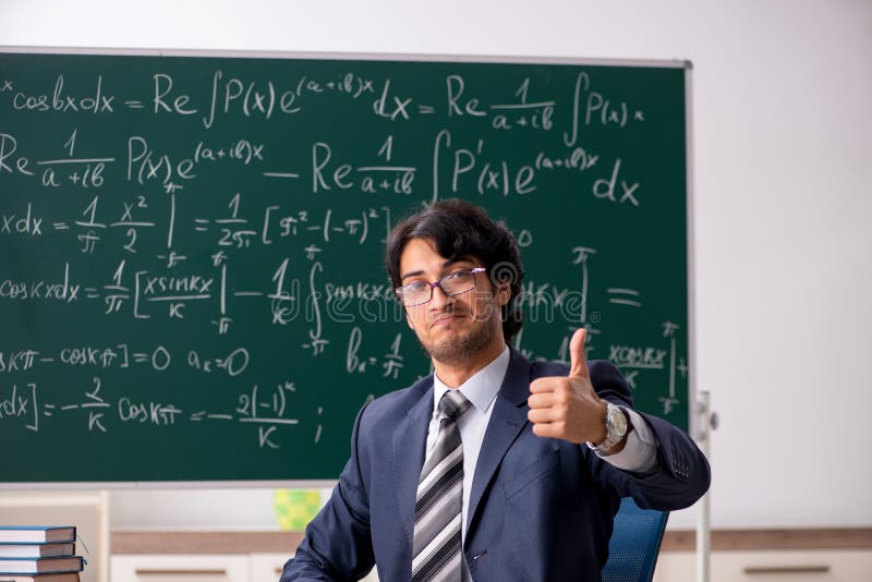 The Young Male Math Teacher in Classroom Stock Image - Image of high ...