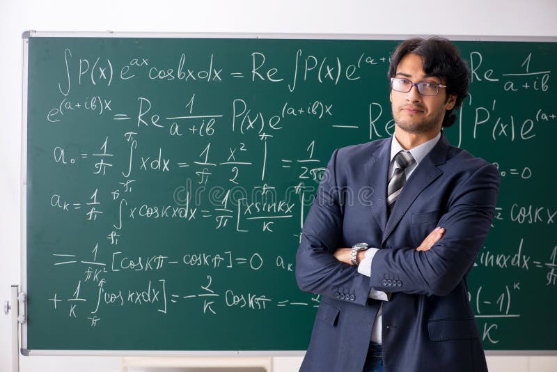 The Young Male Math Teacher in Classroom Stock Image - Image of lesson ...