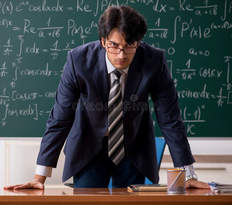 Young Male Math Teacher in Classroom Stock Image - Image of classroom ...