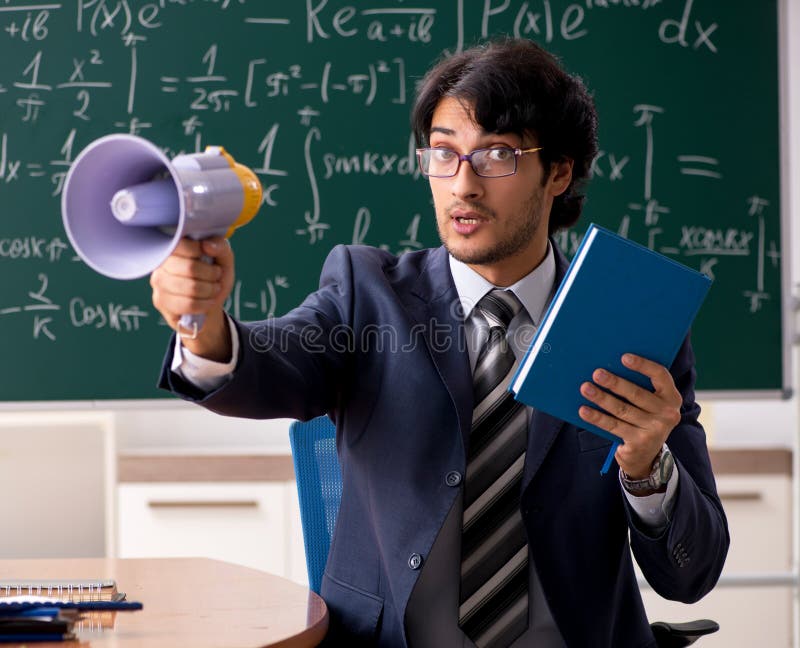 Young Male Math Teacher in Classroom Stock Photo - Image of chalkboard ...