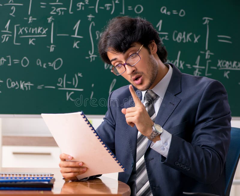 Young Male Math Teacher in Classroom Stock Photo - Image of green ...
