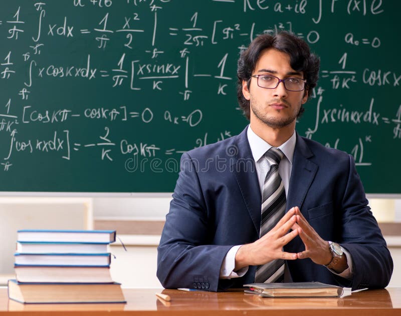 Young Male Math Teacher in Classroom Stock Photo - Image of chalkboard ...