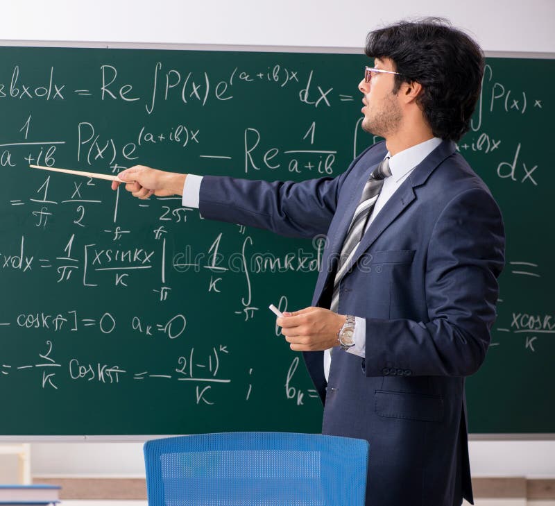 Young Male Math Teacher in Classroom Stock Photo - Image of ...
