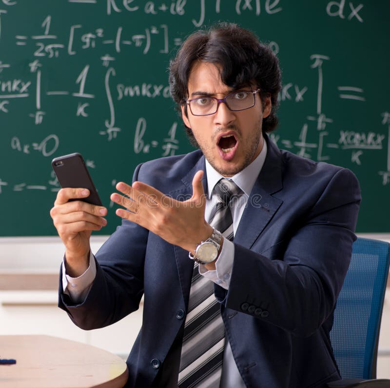 Young Male Math Teacher in Classroom Stock Image - Image of chalkboard ...