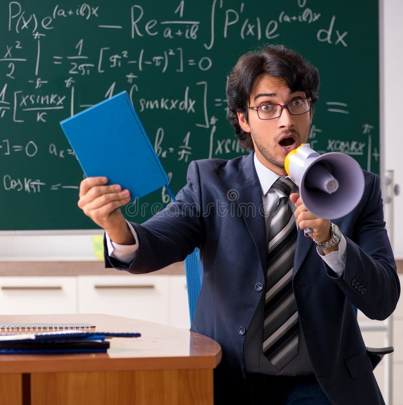 Young Male Math Teacher in Classroom Stock Photo - Image of formula ...