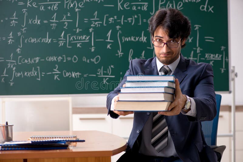 The Young Male Math Teacher in Classroom Stock Image - Image of math ...