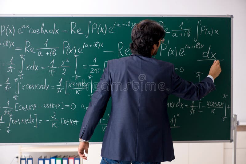The Young Male Math Teacher in Classroom Stock Image - Image of ...