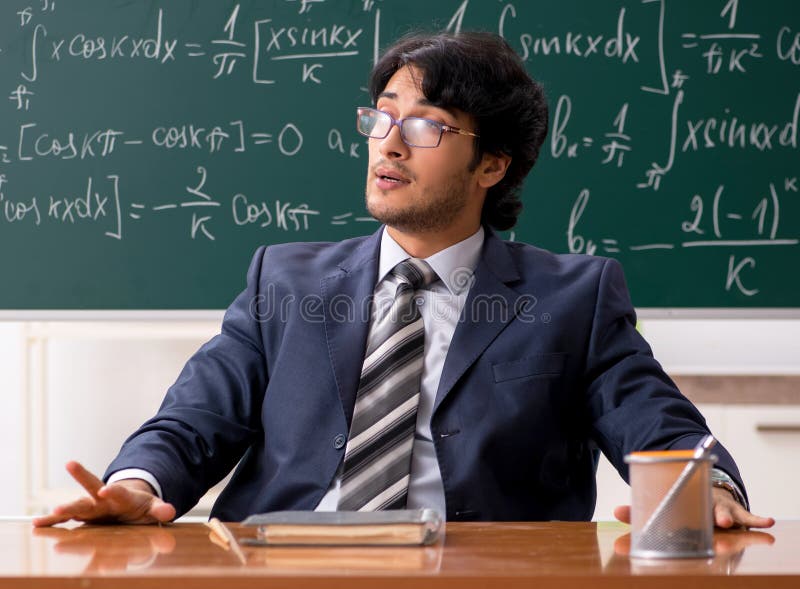 Young Male Math Teacher in Classroom Stock Photo - Image of exam ...