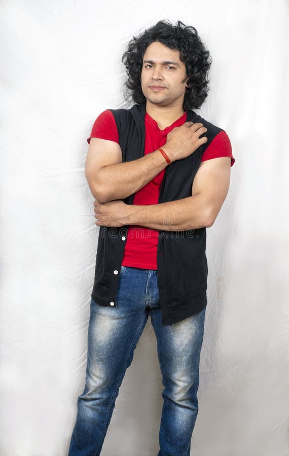 Young Male Model Wearing Red Tshirt Stock Photo - Image of jeans, hair ...