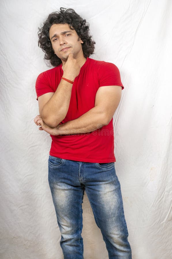 Young Male Model Wearing Red Tshirt Stock Image - Image of traditional ...