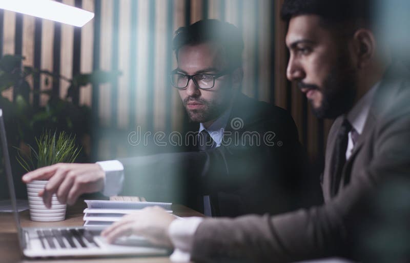 Two Middle-aged Business Workers Work at a Desk in an Office. Stock ...