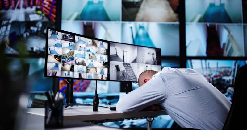 Young Male Operator Sleeping on Desk Stock Image - Image of guard ...