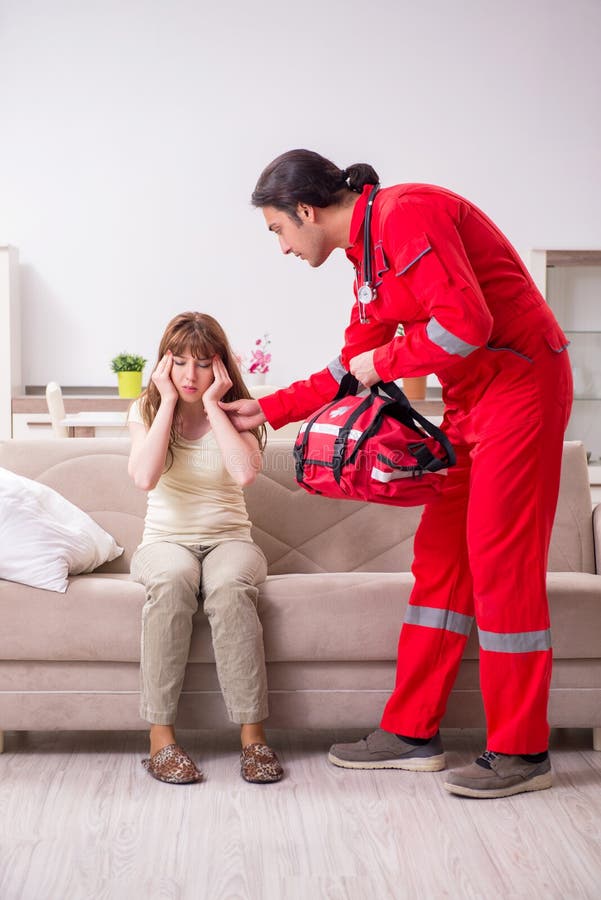 Young Male Paramedic Visiting Young Woman Stock Photo - Image of ...