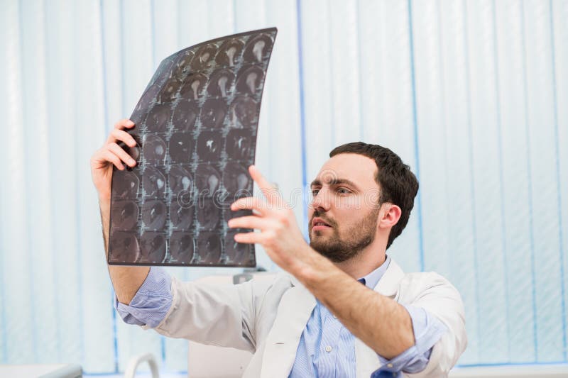 174 Doctor Reading Mri Scan Stock Photos - Free & Royalty-Free Stock ...