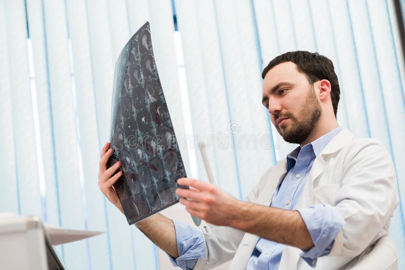 174 Doctor Reading Mri Scan Stock Photos - Free & Royalty-Free Stock ...