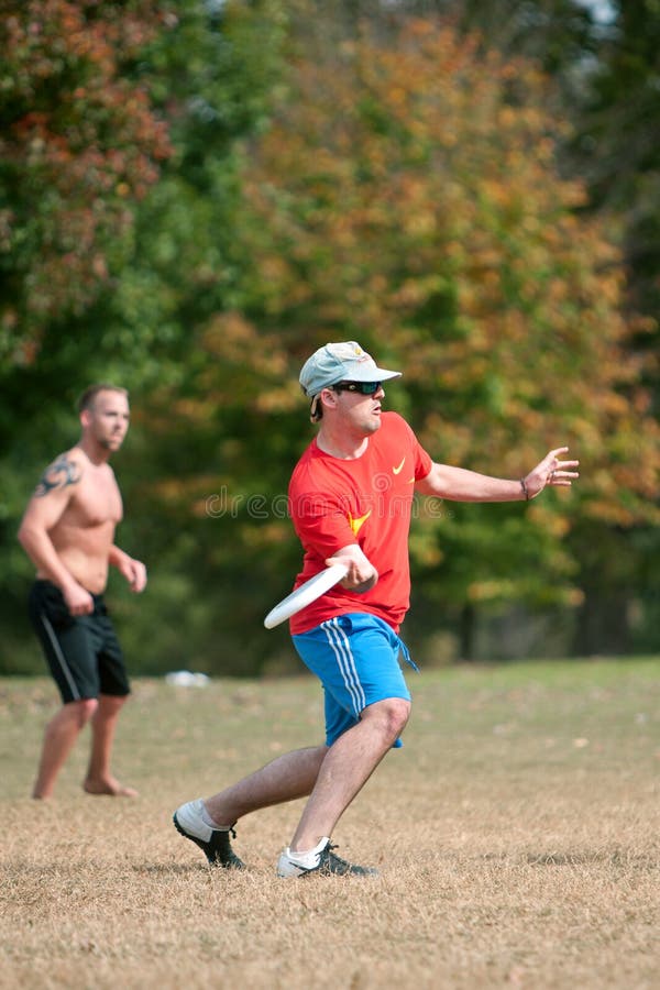 Young Male Plays Ultimate Frisbee in Park Editorial Photography - Image ...