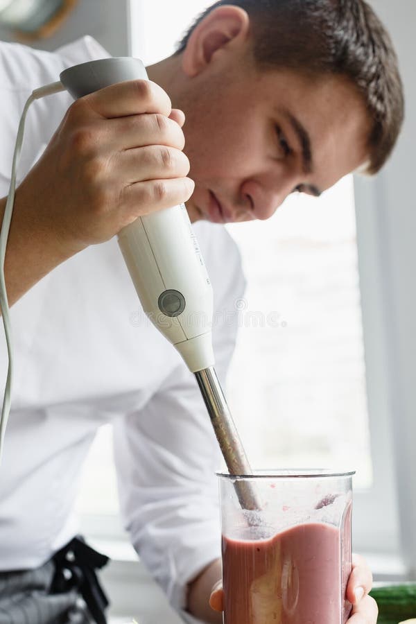 Young Male Preparing Smoothie Stock Photo - Image of indoor, home: 90815092