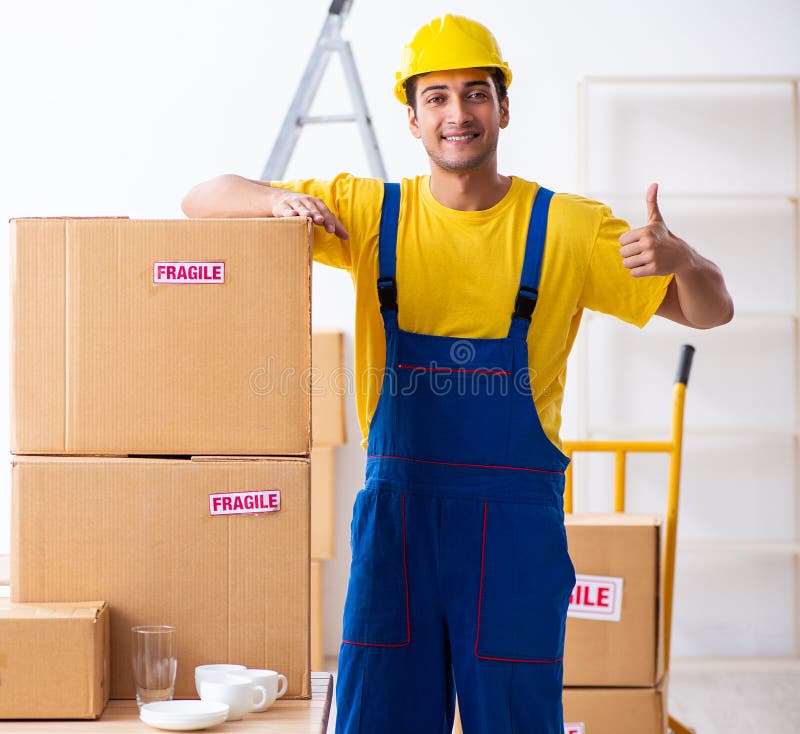 Young Male Professional Mover Doing Home Relocation Stock Photo - Image ...