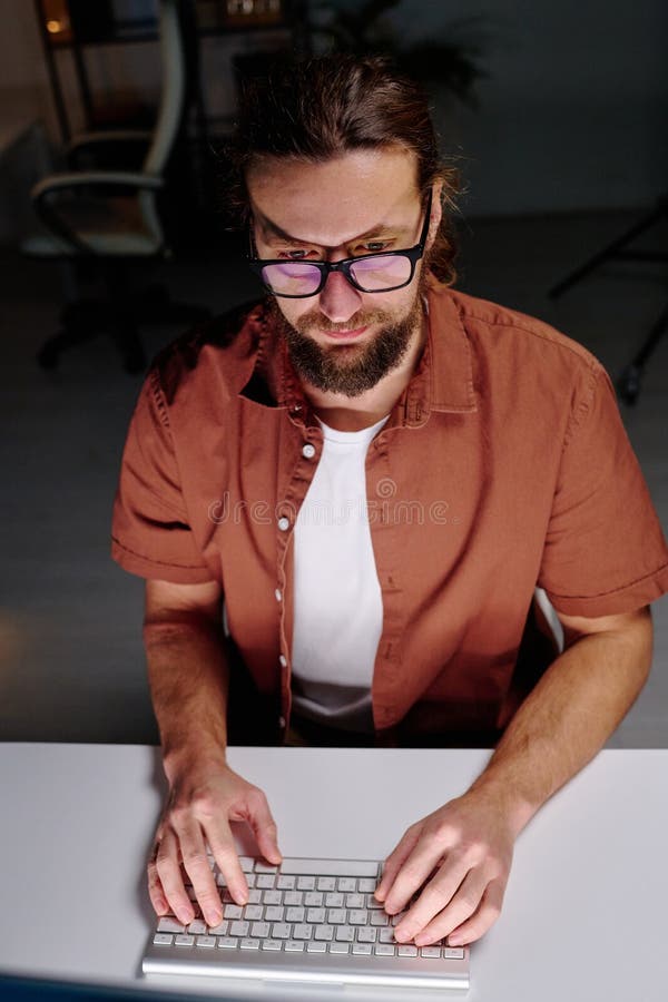 Young Male Programmer In Eyeglasses Looking At Computer Screen Stock Image Image Of Computing