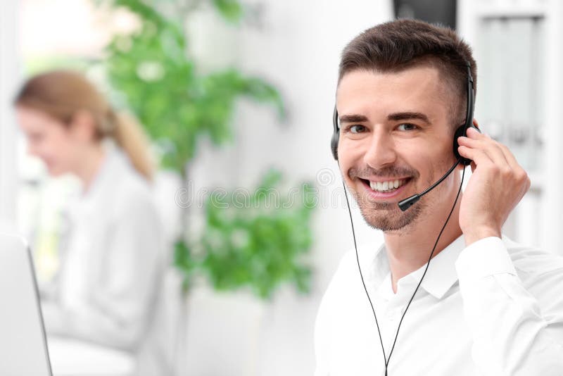 Male Receptionist with Headset at Desk Stock Image - Image of company ...