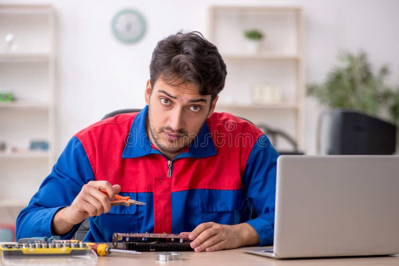 Young Male Repairman Repairing Computer Stock Image - Image of warranty ...