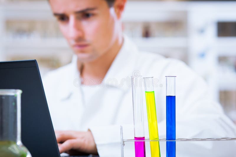 Young Male Researcher in a Lab Stock Image - Image of microscope, adult ...