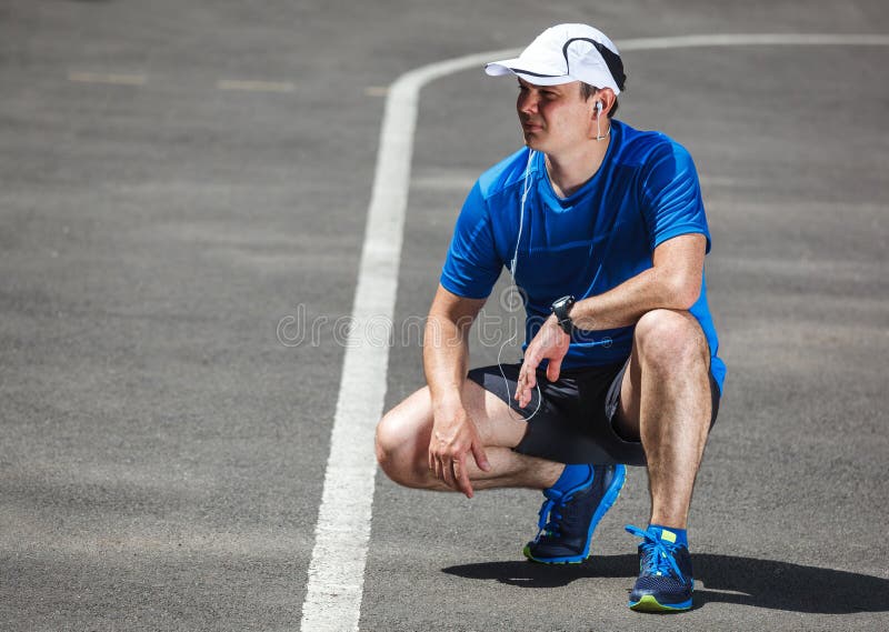 Young Male Runner Getting Ready Stock Photo - Image of shirt, exercise ...