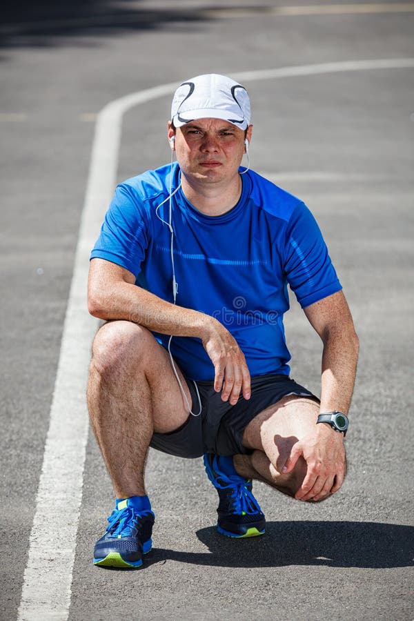 Young Male Runner Getting Ready Stock Photo - Image of outdoor ...
