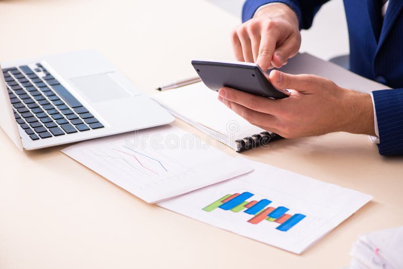 Young Male Sales Analyst in Growth Concept Stock Photo - Image of desk ...
