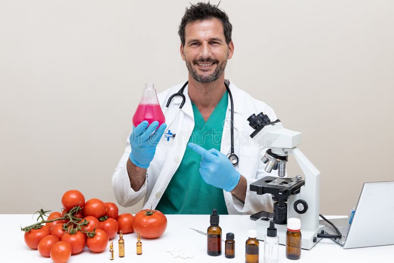 Young Male Scientist Doing Experimentation on Vegetables in the ...