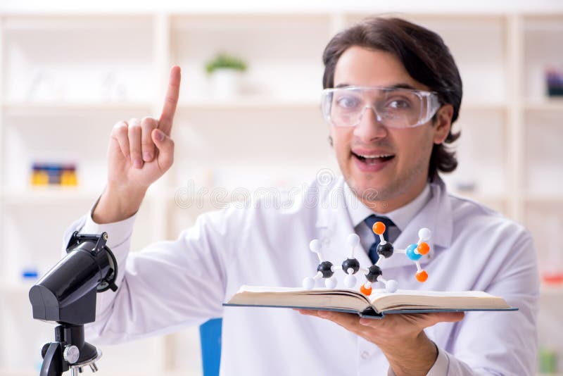 The Young Male Scientist Working in the Lab Stock Photo - Image of ...