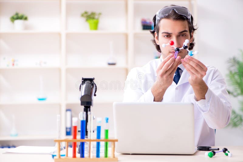 The Young Male Scientist Working in the Lab Stock Image - Image of ... The Young Male Scientist Working in the Lab Stock Image - Image of ...