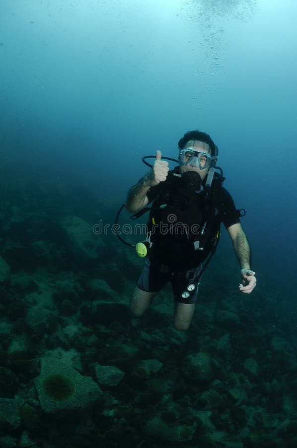 Male scuba diver ,OK sighn stock image. Image of egypt - 15042245