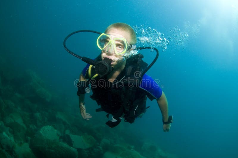 Young Male Scuba Diver Swims Over Reef Stock Image - Image of female ...
