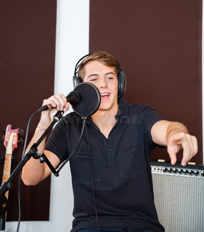 Young Male Singer Performing in Studio Stock Photo - Image of indy ...