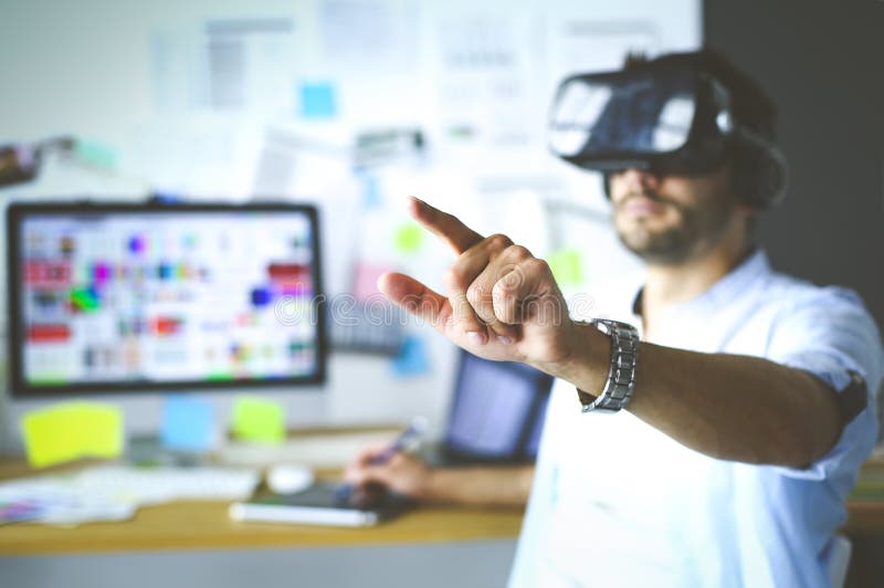 Young Male Software Programmer Testing a New App with 3d Virtual ...
