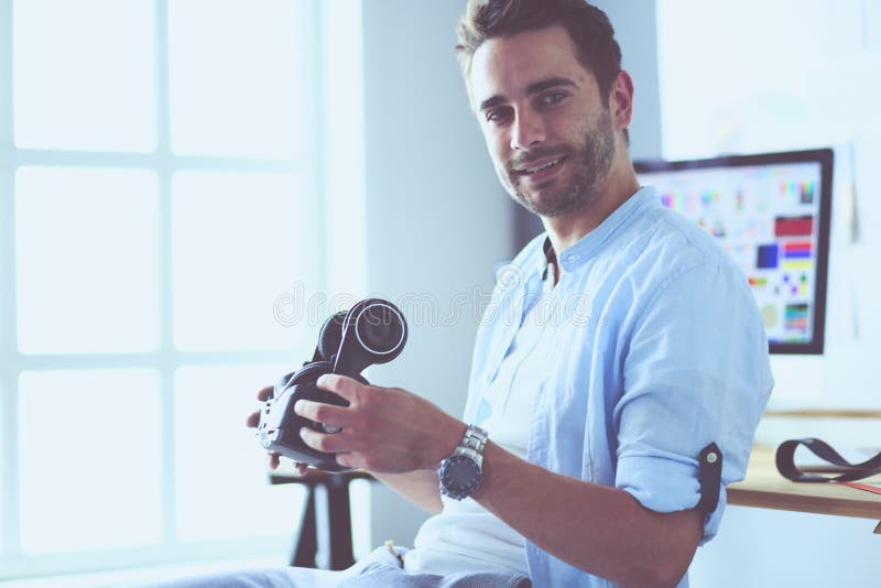 Young Male Software Programmer Testing a New App with 3d Virtual ...
