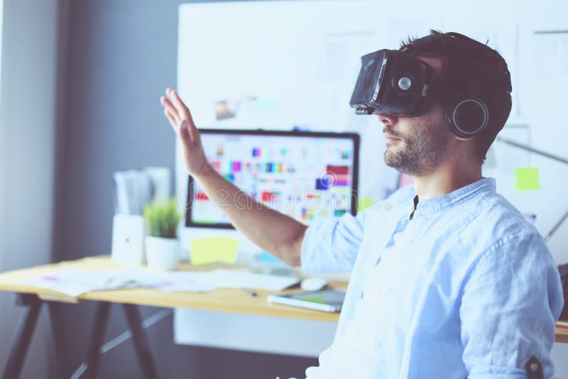 Young Male Software Programmer Testing a New App with 3d Virtual ...