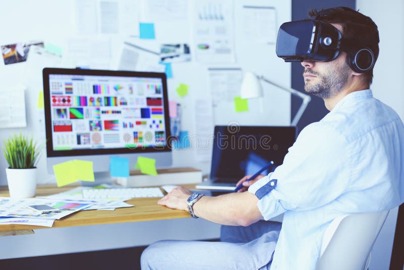 Young Male Software Programmer Testing a New App with 3d Virtual ...