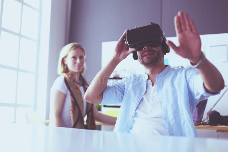 Young Male Software Programmer Testing a New App with 3d Virtual ...