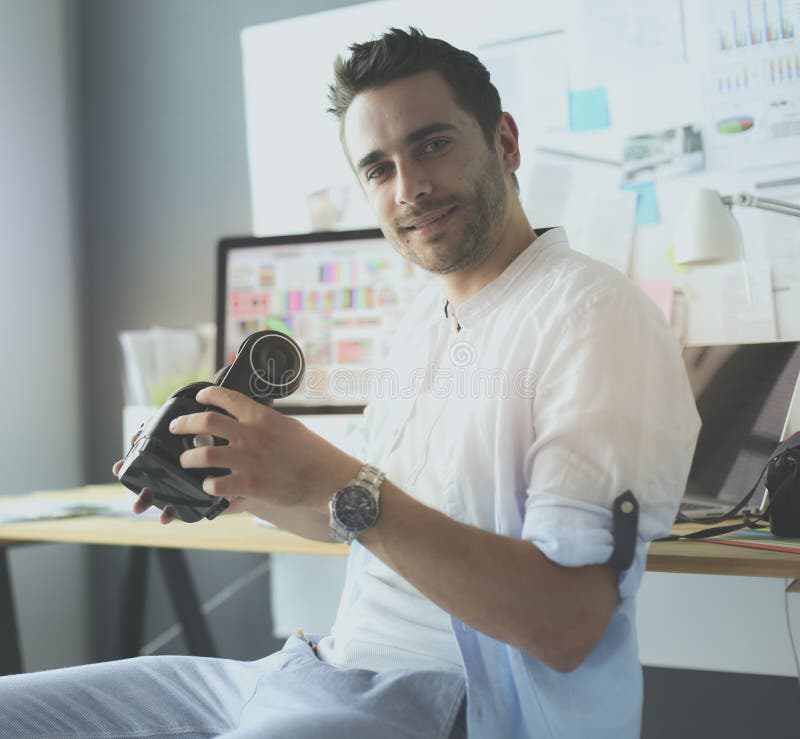 Young Male Software Programmer Testing a New App with 3d Virtual ...