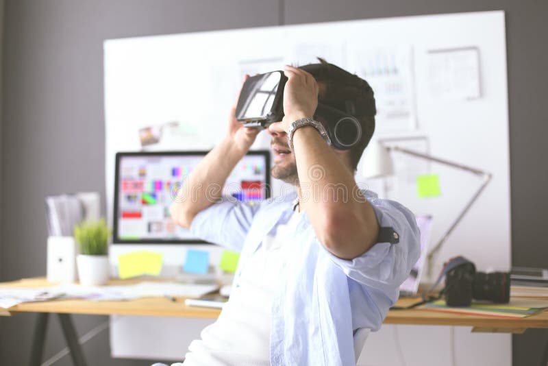 Young Male Software Programmer Testing a New App with 3d Virtual ...