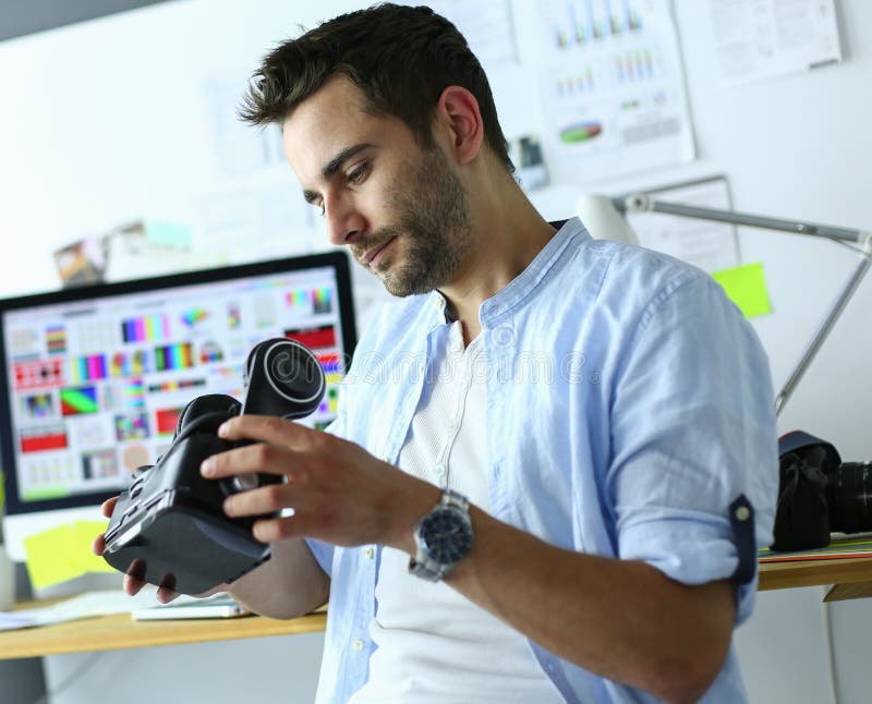 Young Male Software Programmer Testing a New App with 3d Virtual ...