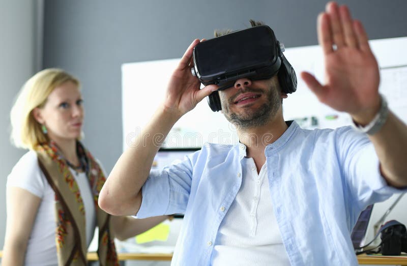 Young Male Software Programmer Testing a New App with 3d Virtual ...