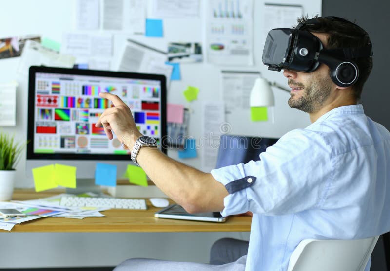 Young Male Software Programmer Testing a New App with 3d Virtual ...