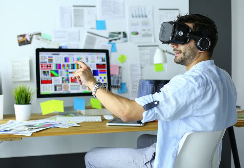 Young Male Software Programmer Testing a New App with 3d Virtual ...