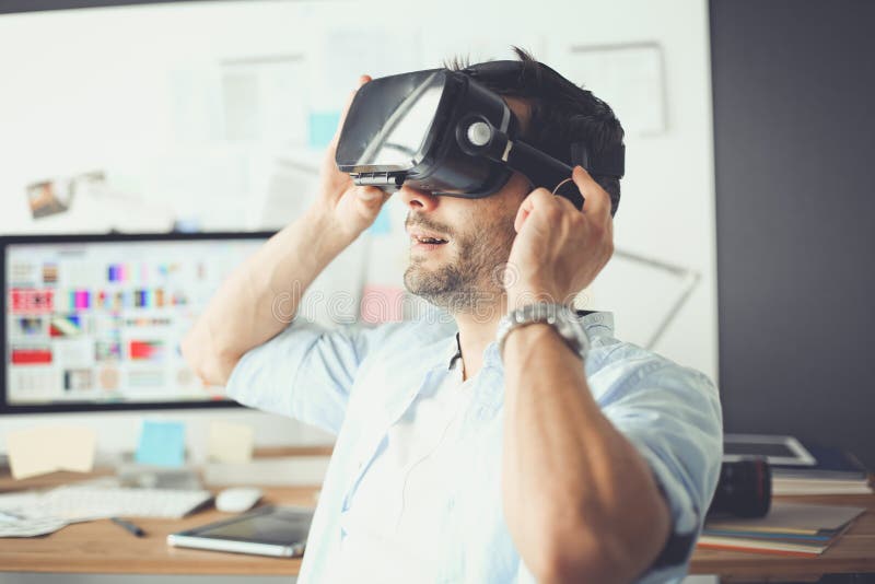 Young Male Software Programmer Testing a New App with 3d Virtual ...